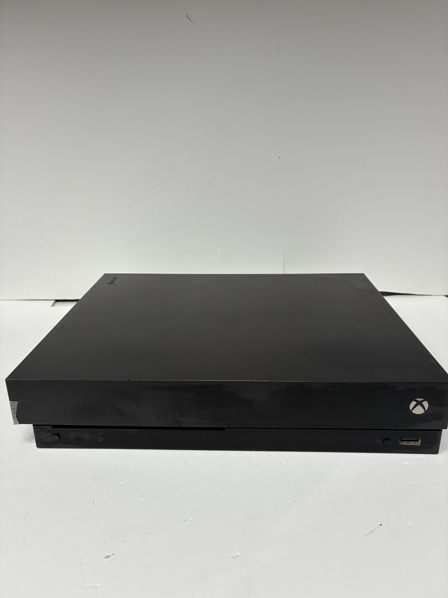 Pre-owned xbox one x console unboxed black with the controller - Own4Less
